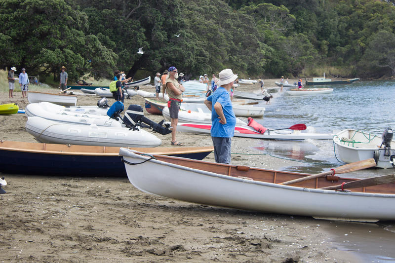 Photograph: People and dinghies on beach, Sullivan's Bay, Mahurangi ...