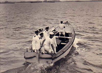 Photograph: Dingy carrying Royal New Zealand Navy officers, Bay of ...