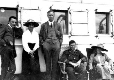 Photograph: Five passengers on board a ship - New Zealand Maritime Museum