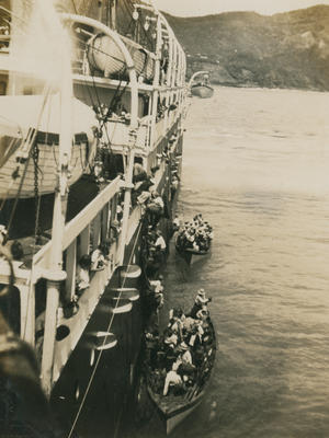 Photograph: Passengers of CORINTHIC loading into rowboats, Panama Canal ...