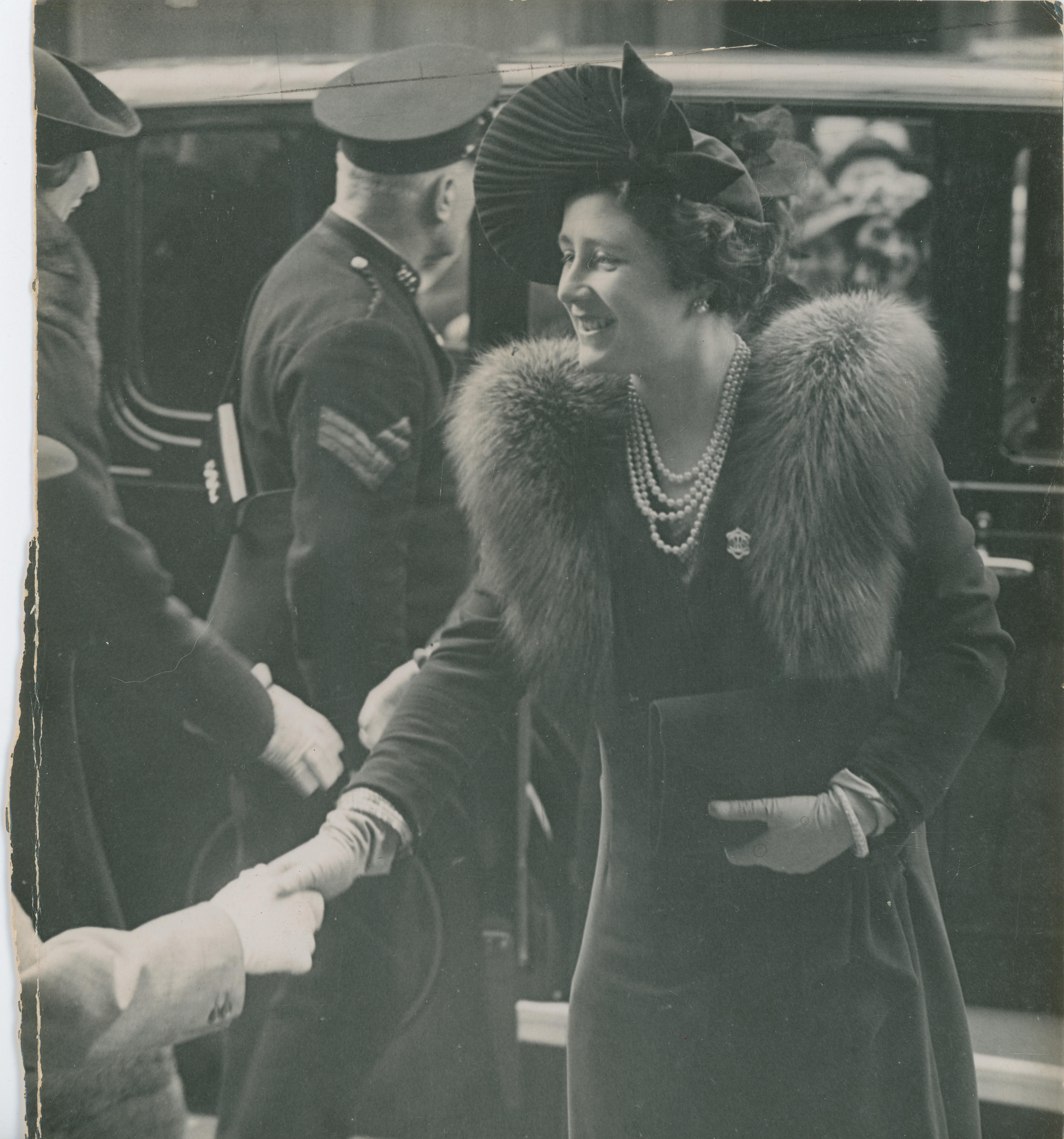 Photograph: Queen Elizabeth The Queen Mother exiting car and being ...