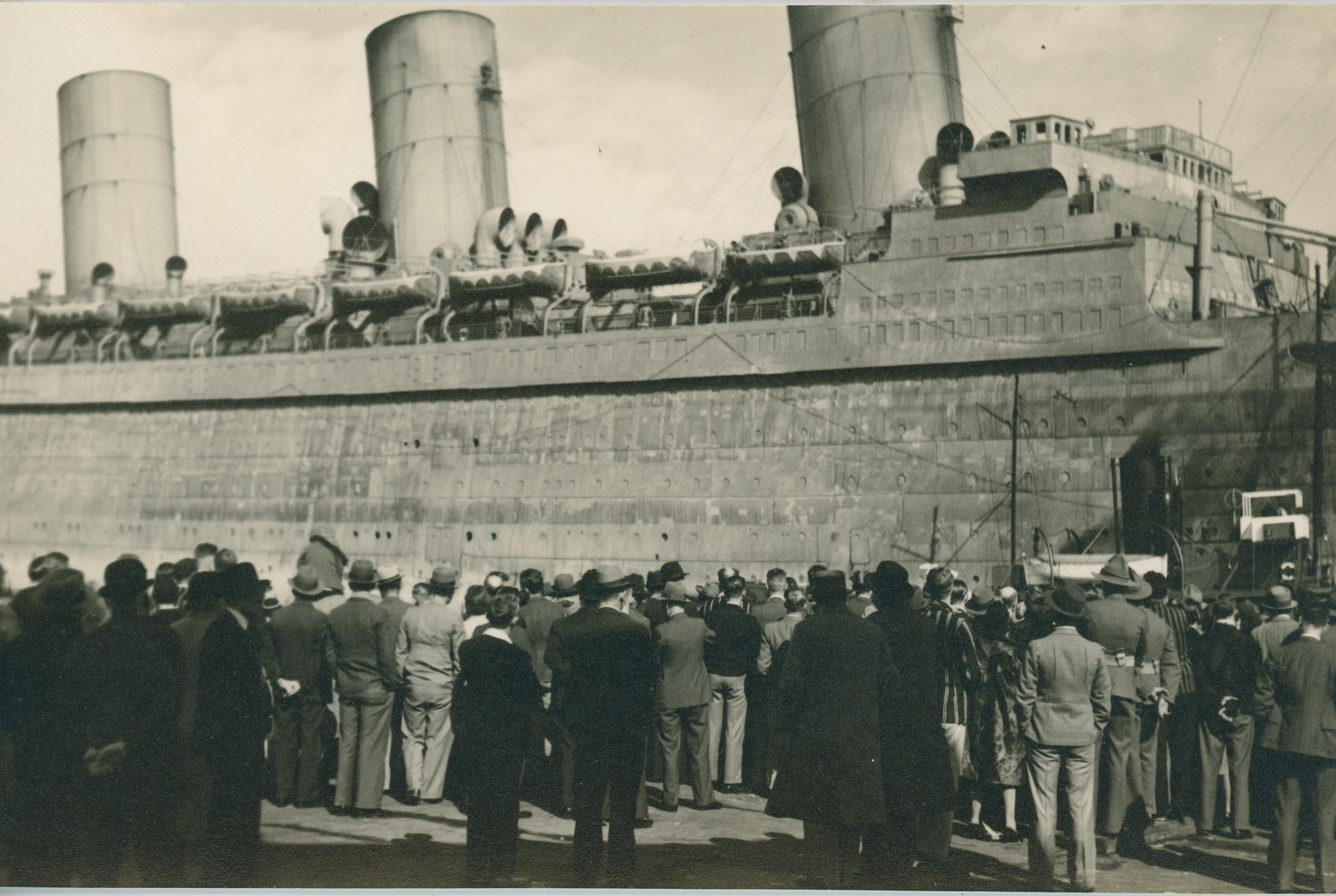 Photograph: Crowd on wharf looking at ship EMPRESS OF BRITAIN (1931 ...