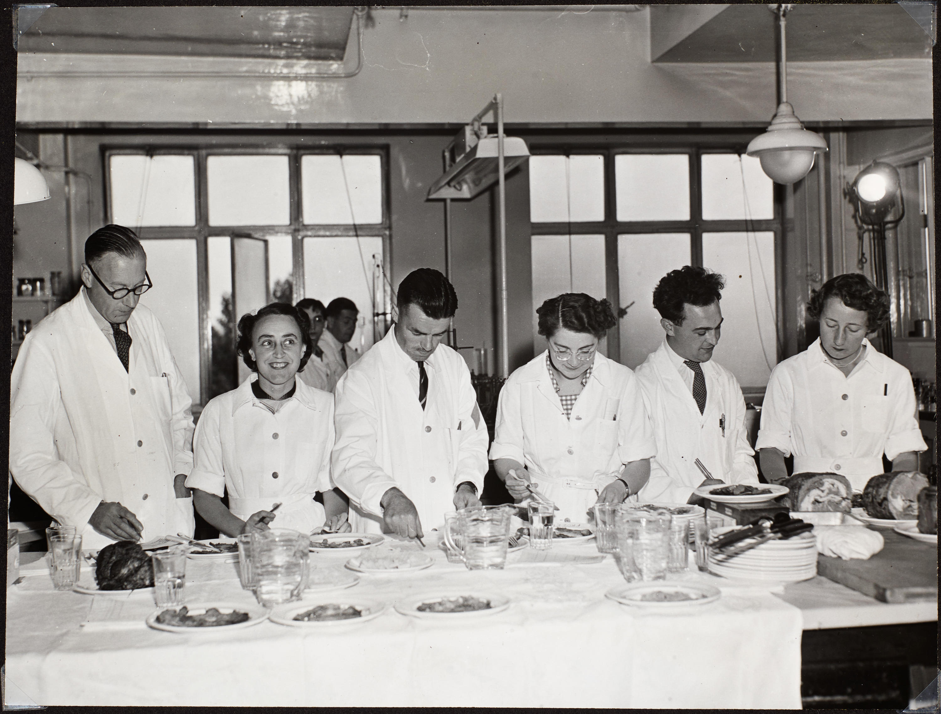 Photograph: Members of J. Lyons & Co. Ltd staff carrying out their own ...
