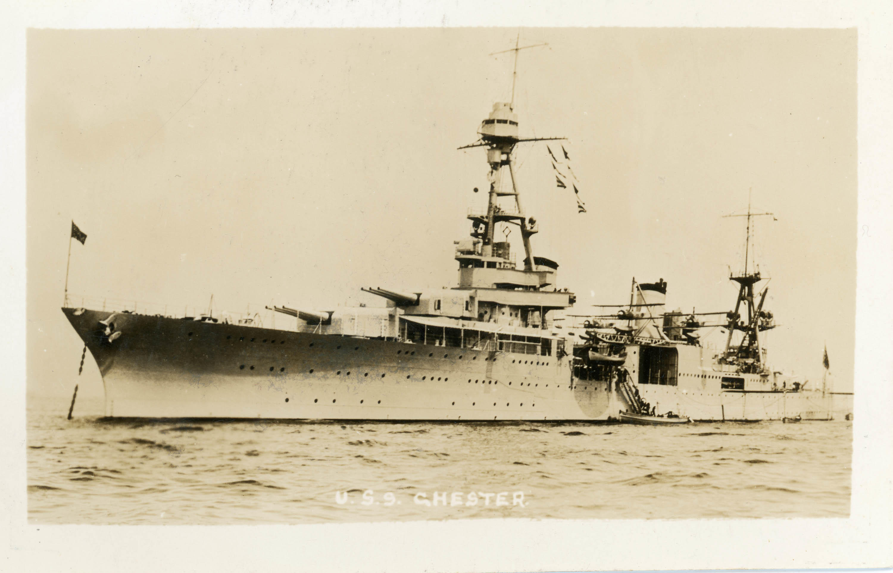 Photograph: USS CHESTER anchored at sea - New Zealand Maritime Museum