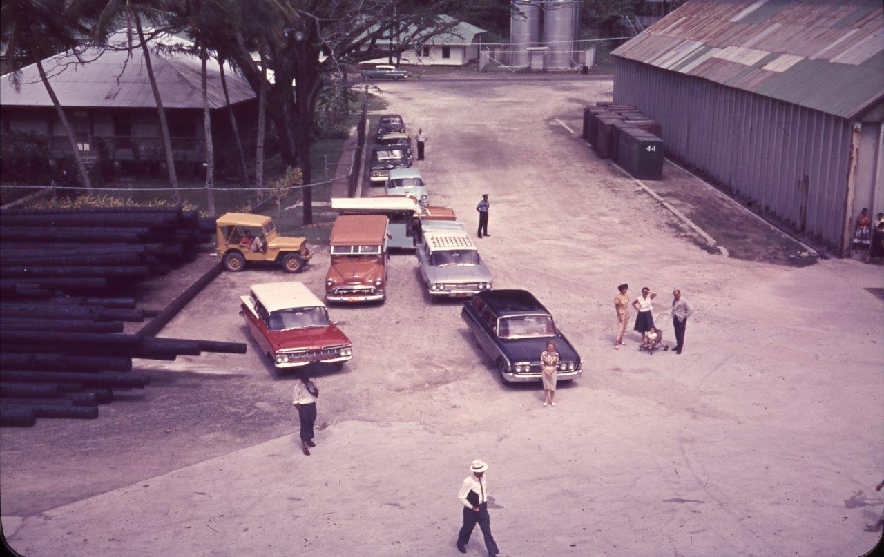 Slide: Cars and people at Pago Pago port - New Zealand Maritime Museum