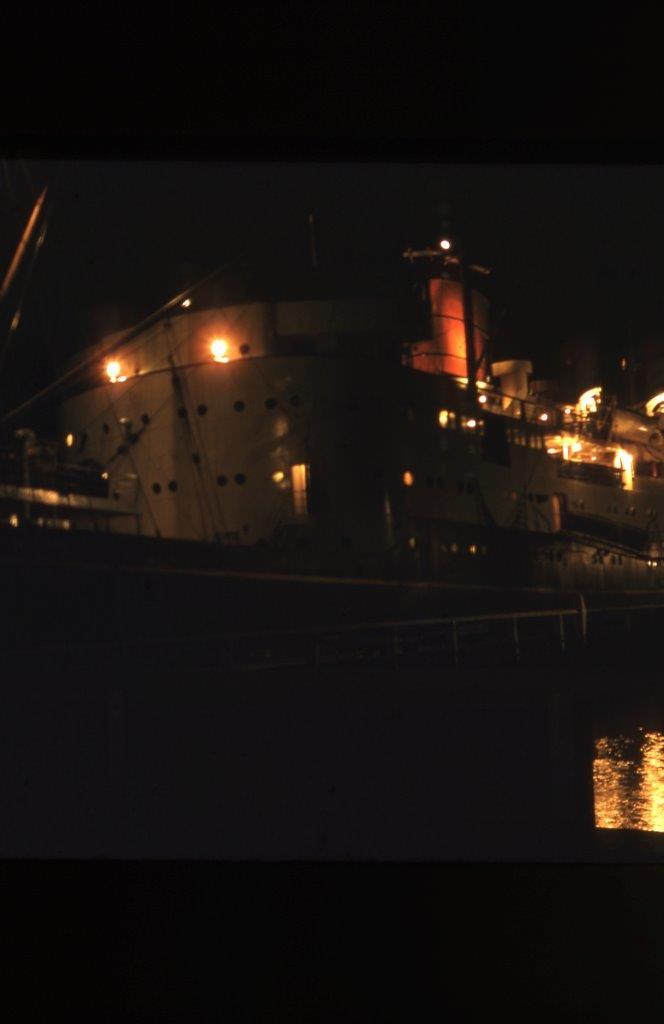 Slide: Night time view (possibly of TOFUA?) - New Zealand Maritime Museum