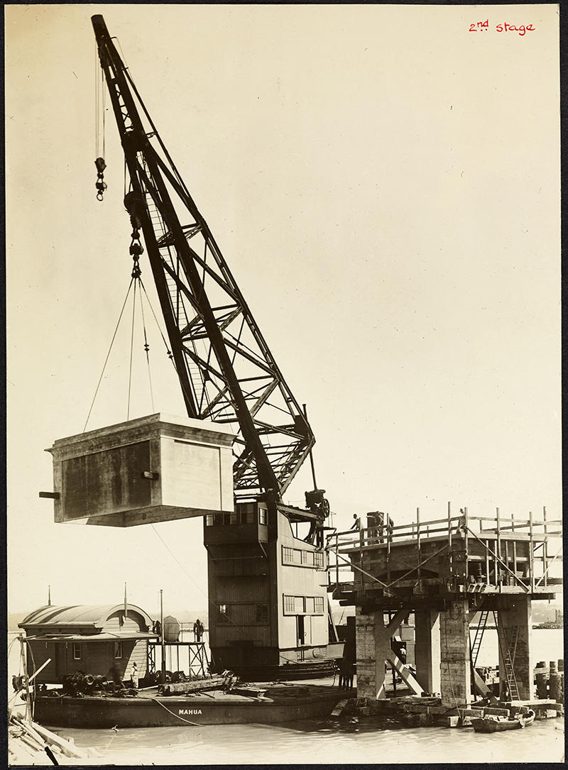 Photograph: Crane lifting the Portal House from the north wall to the ...