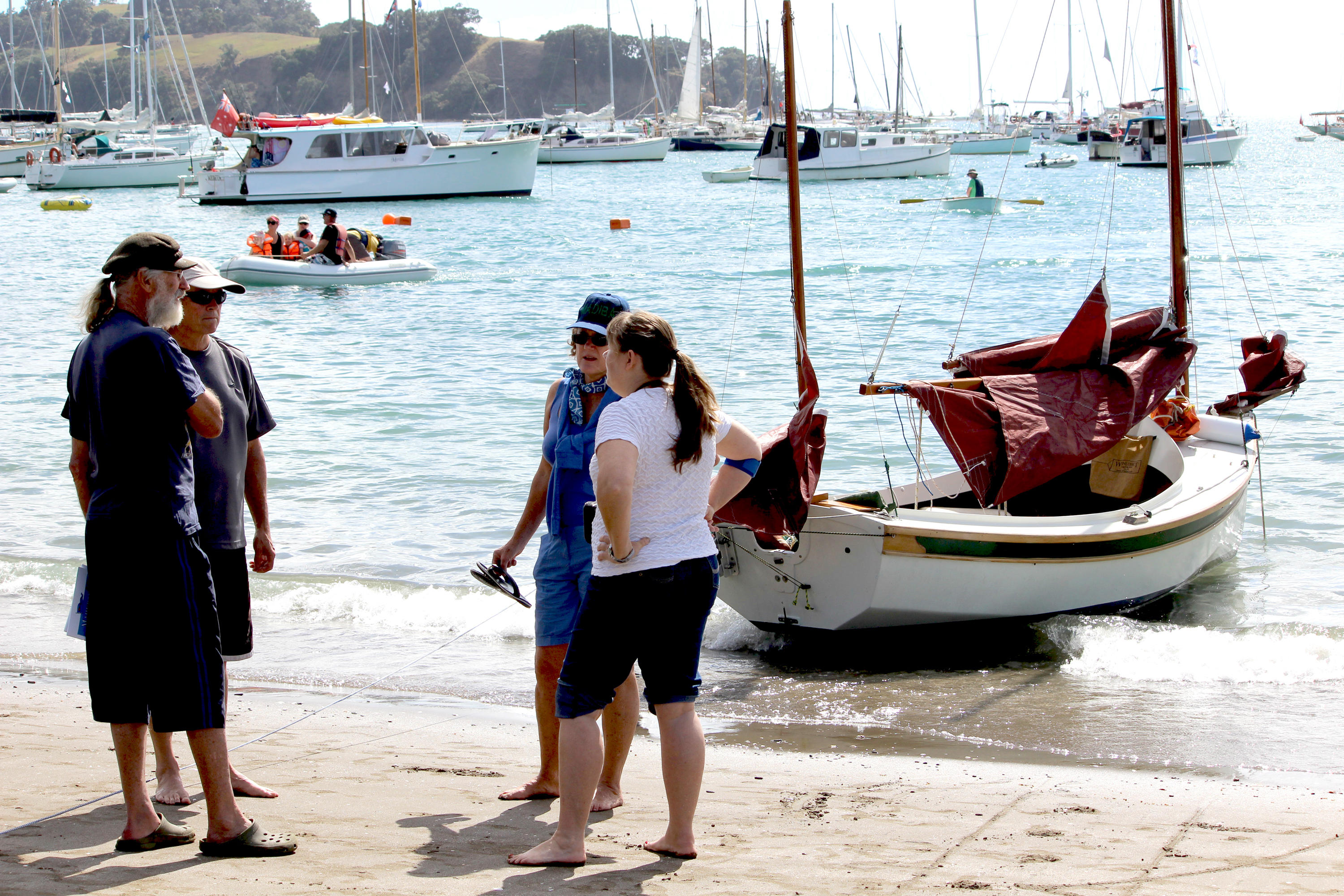 Photograph: People on beach, Sullivan's Bay, Mahurangi Harbour - New ...