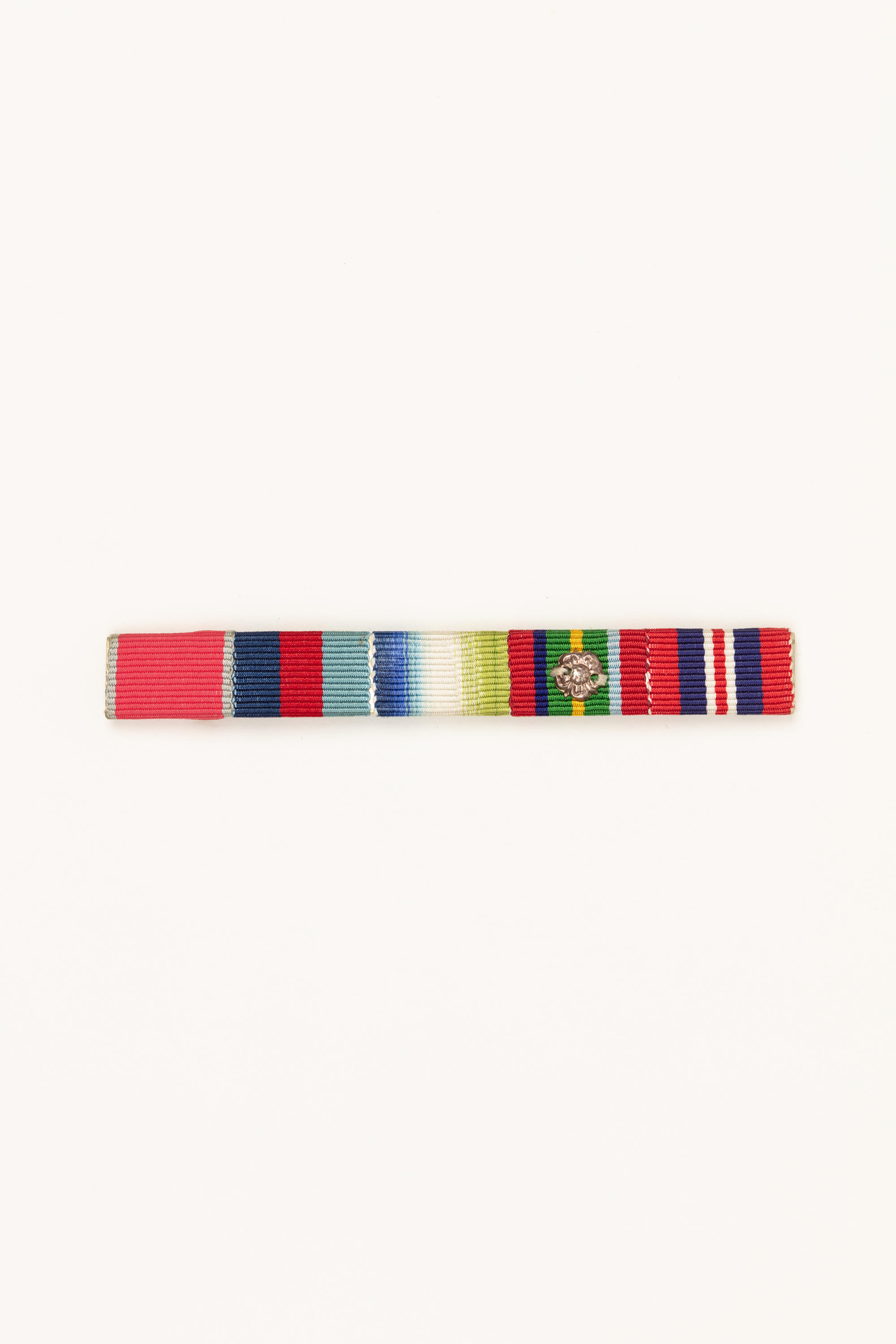 Medals, ribbon bar for MBE and wartime medals awarded to George M ...