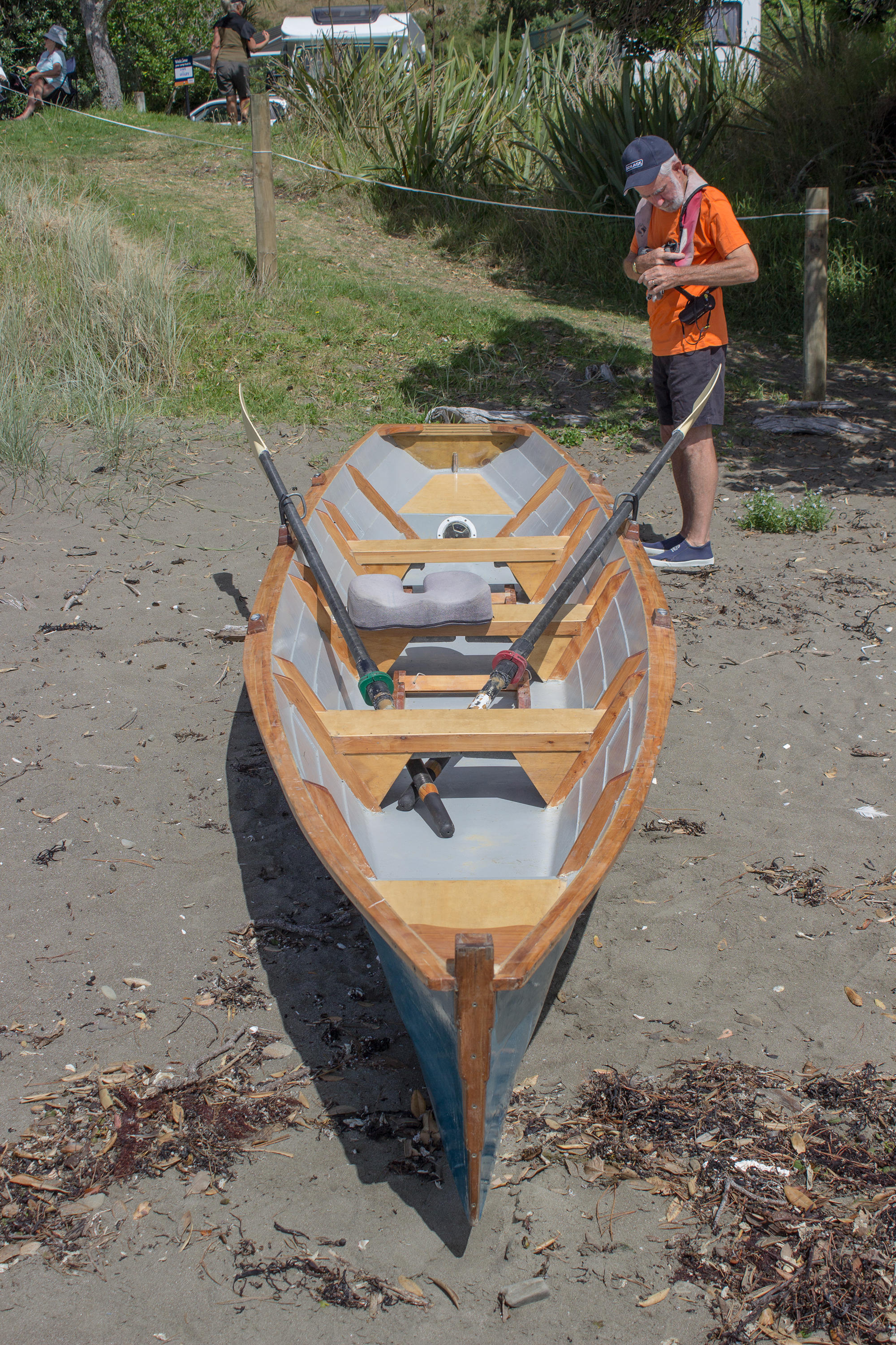 Photograph: Rowing skiff being rowed by person on Mahurangi Harbour ...