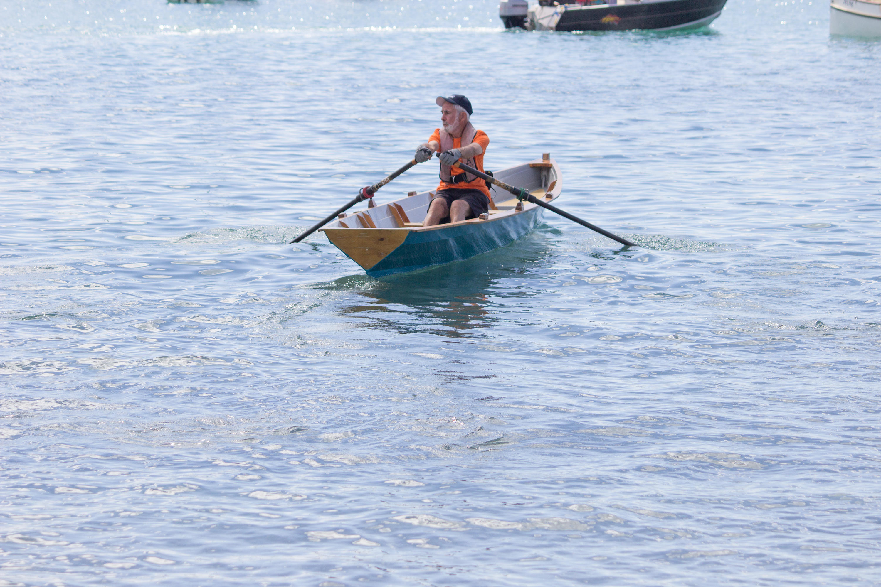 Photograph: Rowing skiff being rowed by person on Mahurangi Harbour ...