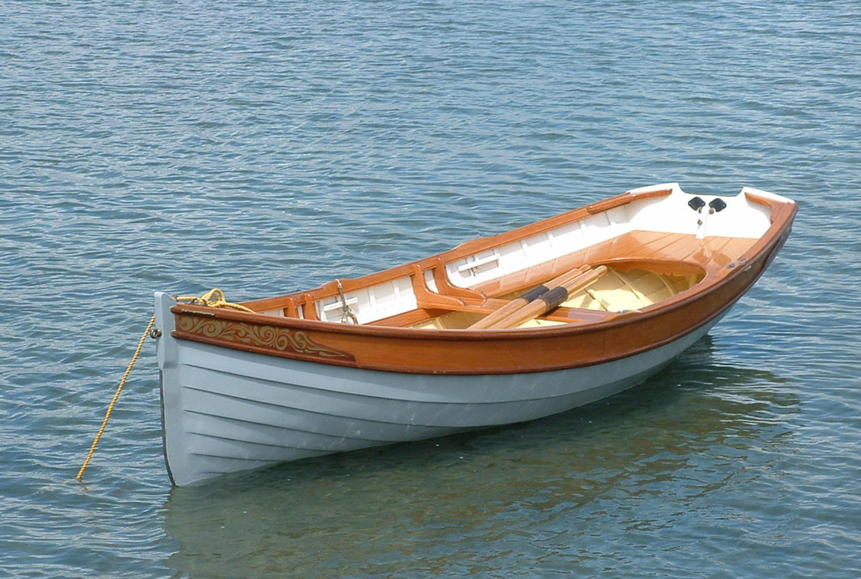 Photograph: Rowing dinghy moored on the Hauraki Gulf - New Zealand ...