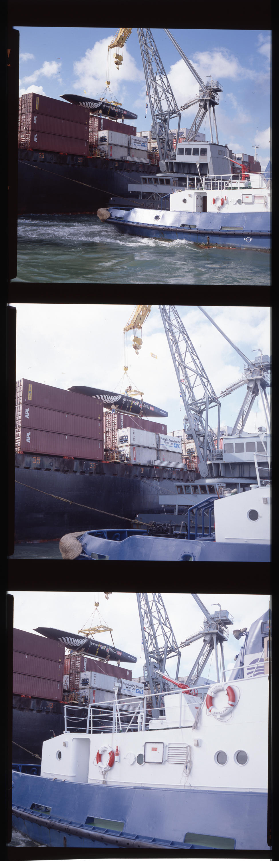 Slide film: Three colour images of NZL 32 (1995) being lifted by ...
