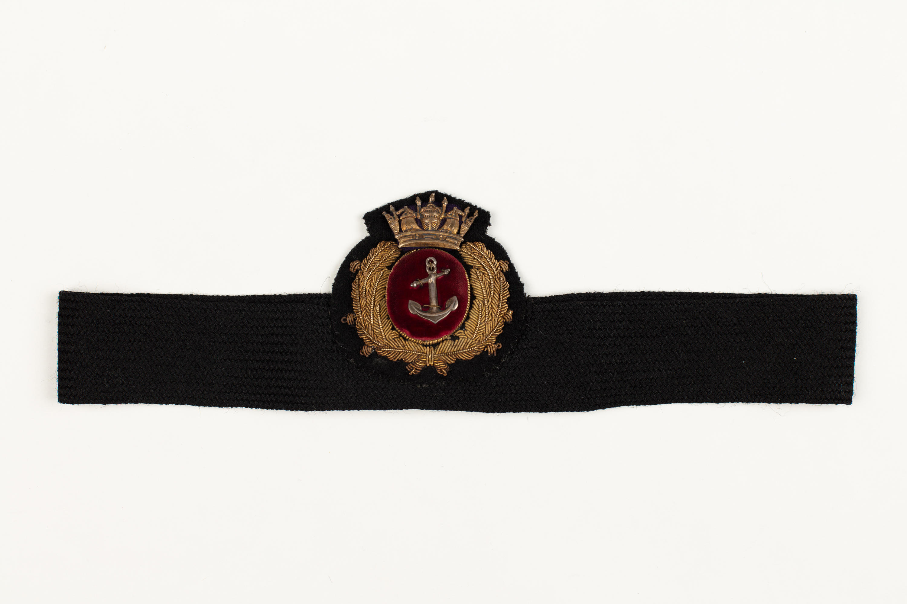 Cap badge, Merchant Navy - New Zealand Maritime Museum