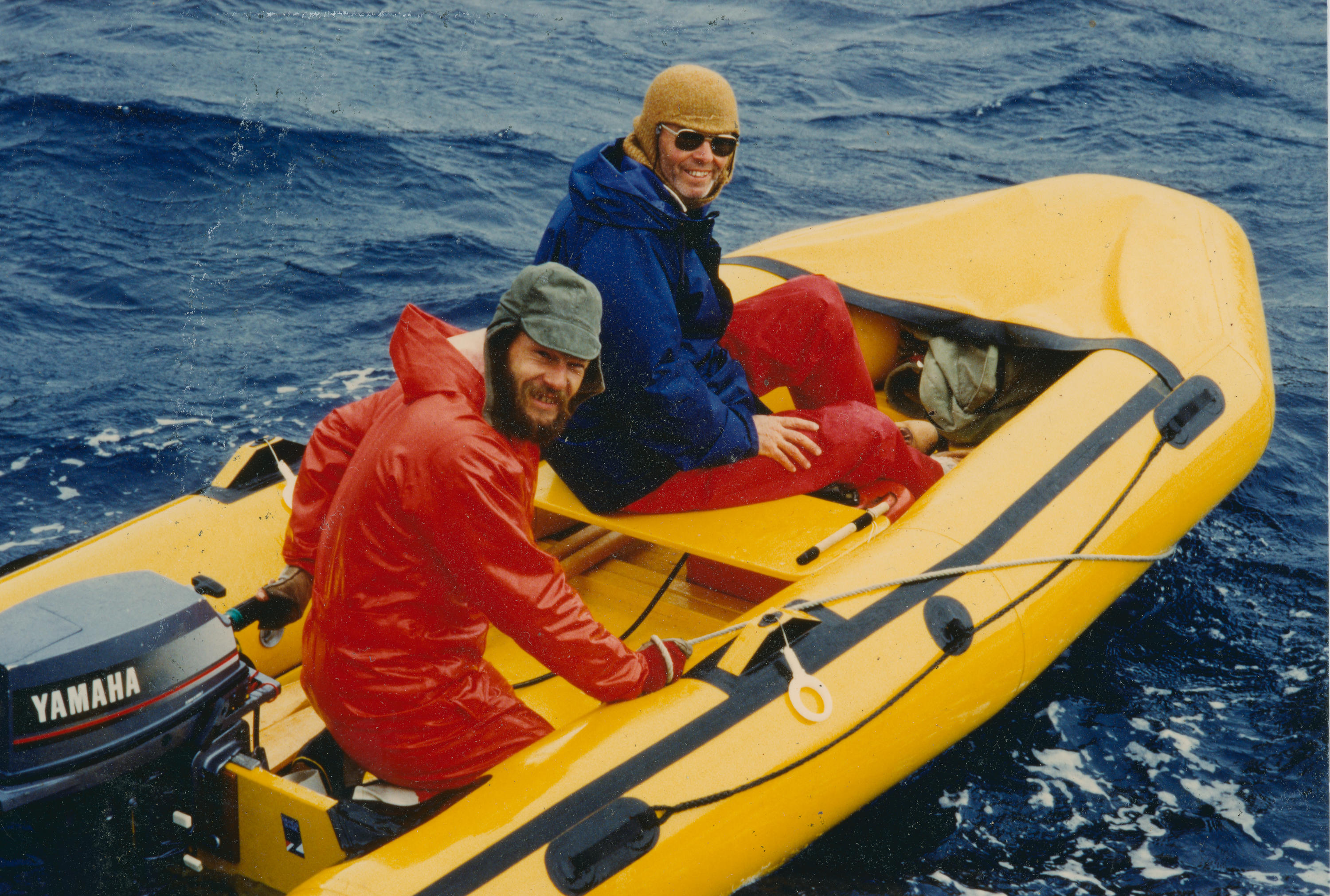 Photograph: Two men in inflatable dinghy at sea - New Zealand Maritime ...