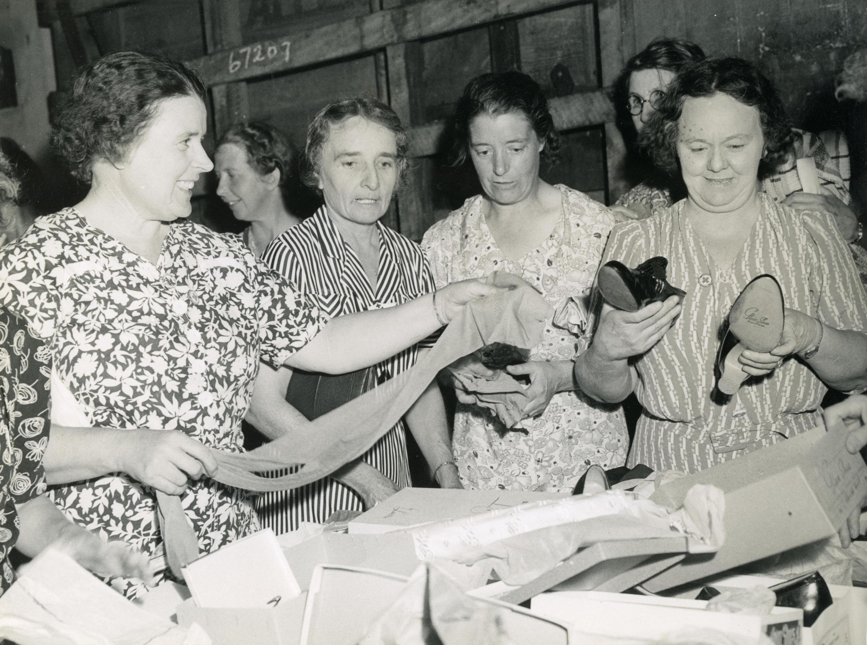 Photograph: Survivors from the sinking of RANGITANE selecting new ...