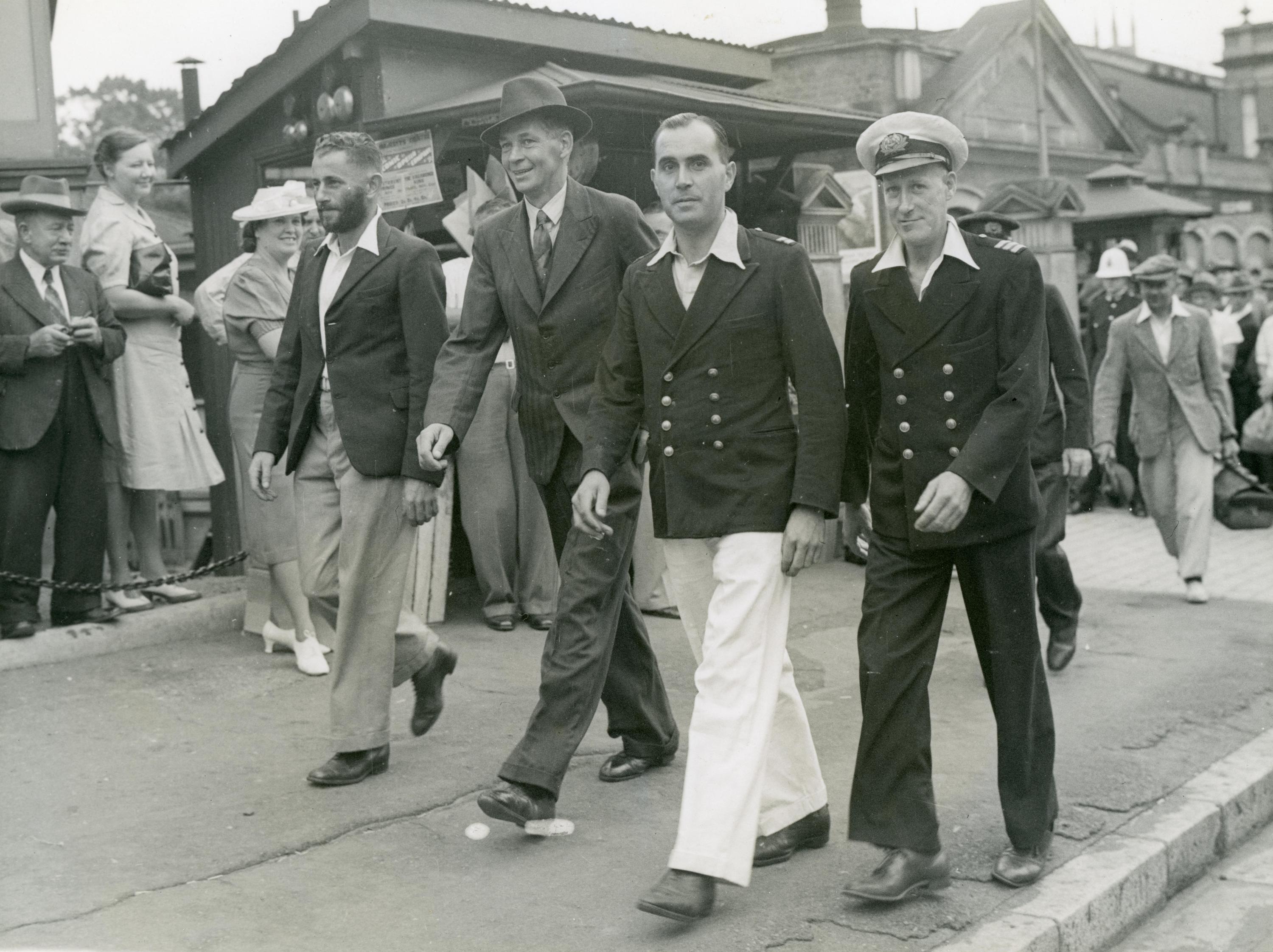 Photograph: Four crew members from RANGITANE and HOLMWOOD arriving at ...