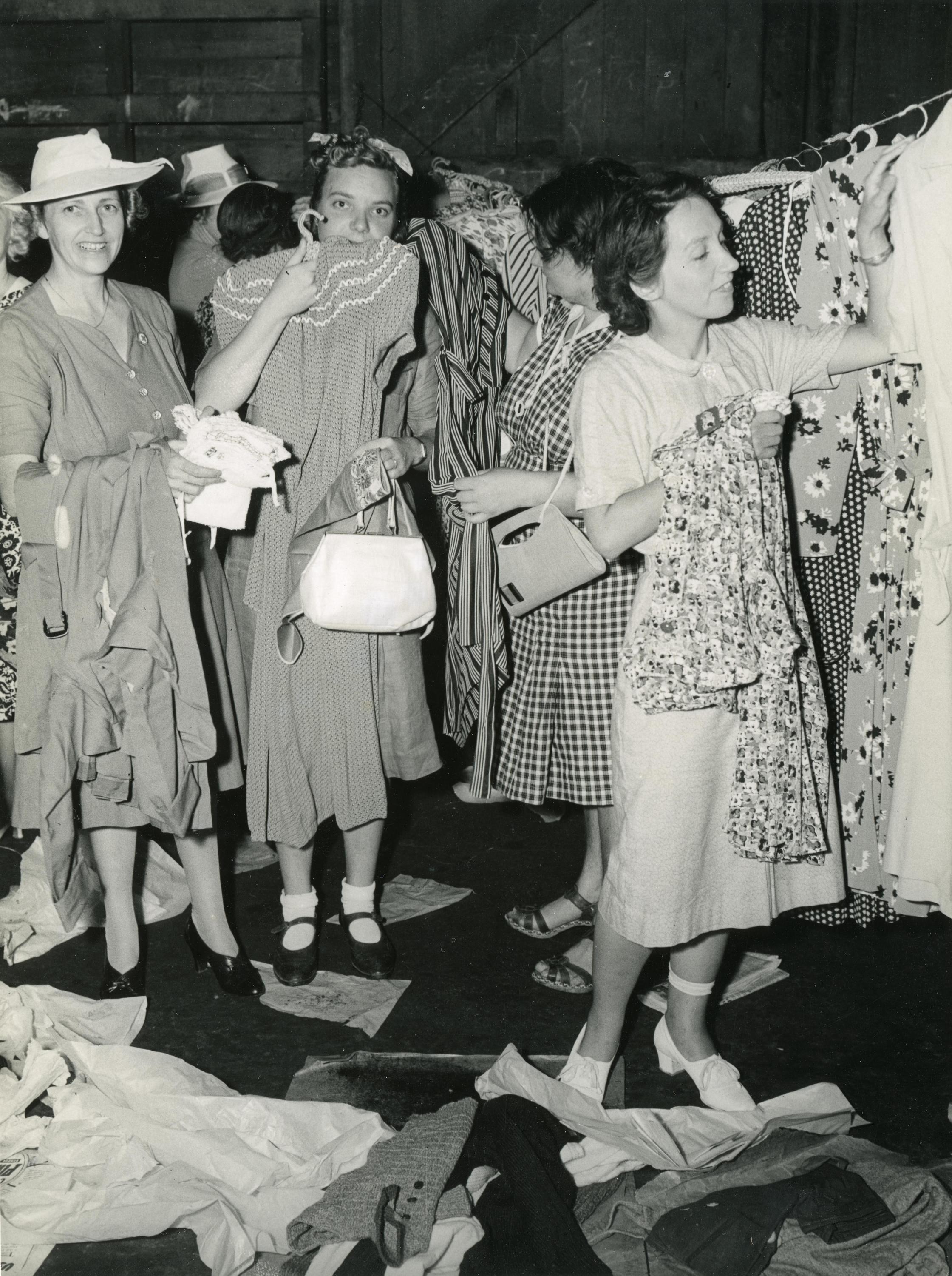 Photograph: Survivors from the sinking of RANGITANE sorting through new ...