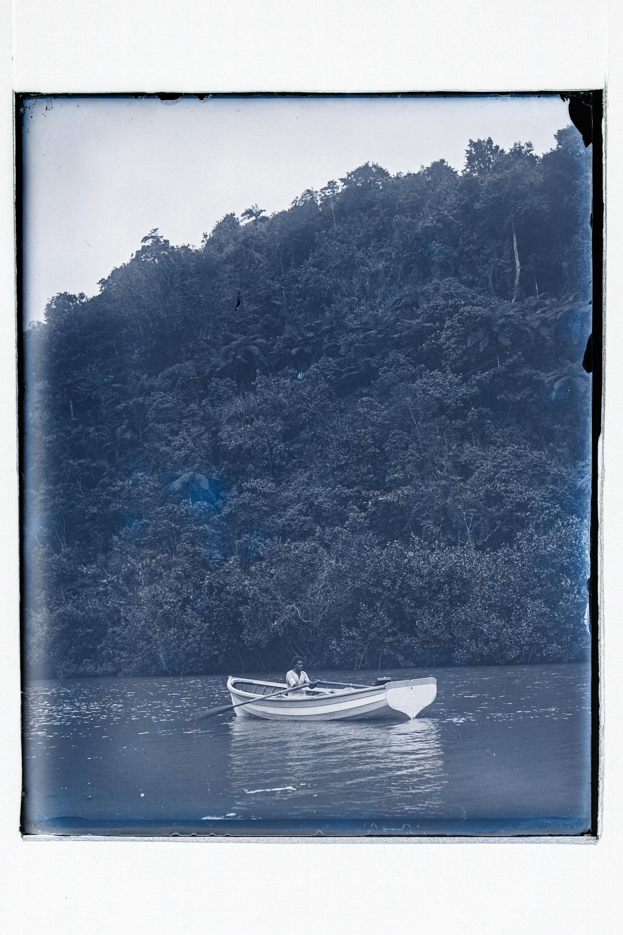 Glass plate: Woman rowing boat - New Zealand Maritime Museum