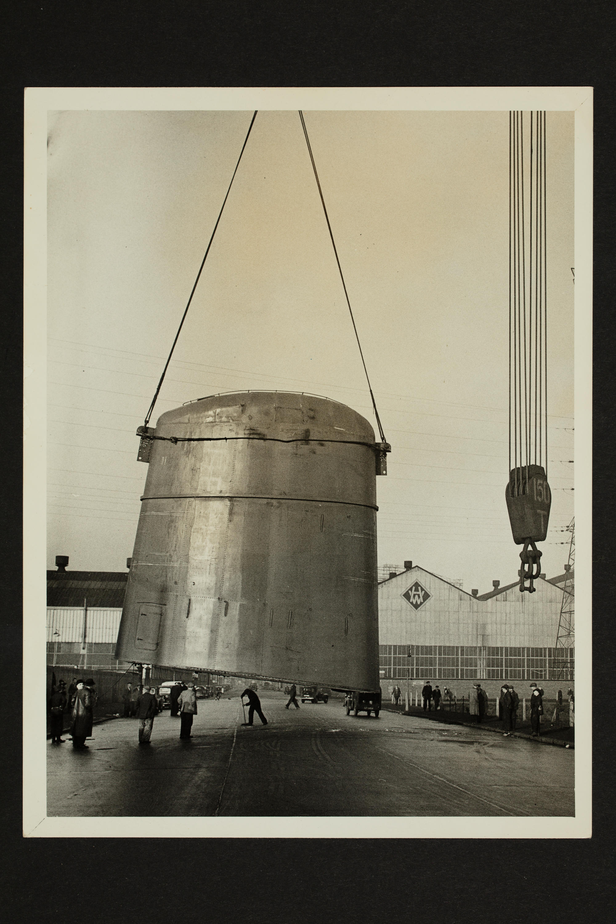 Photograph: SOUTHERN CROSS Funnel[?] being lowered onto wharf - New ...